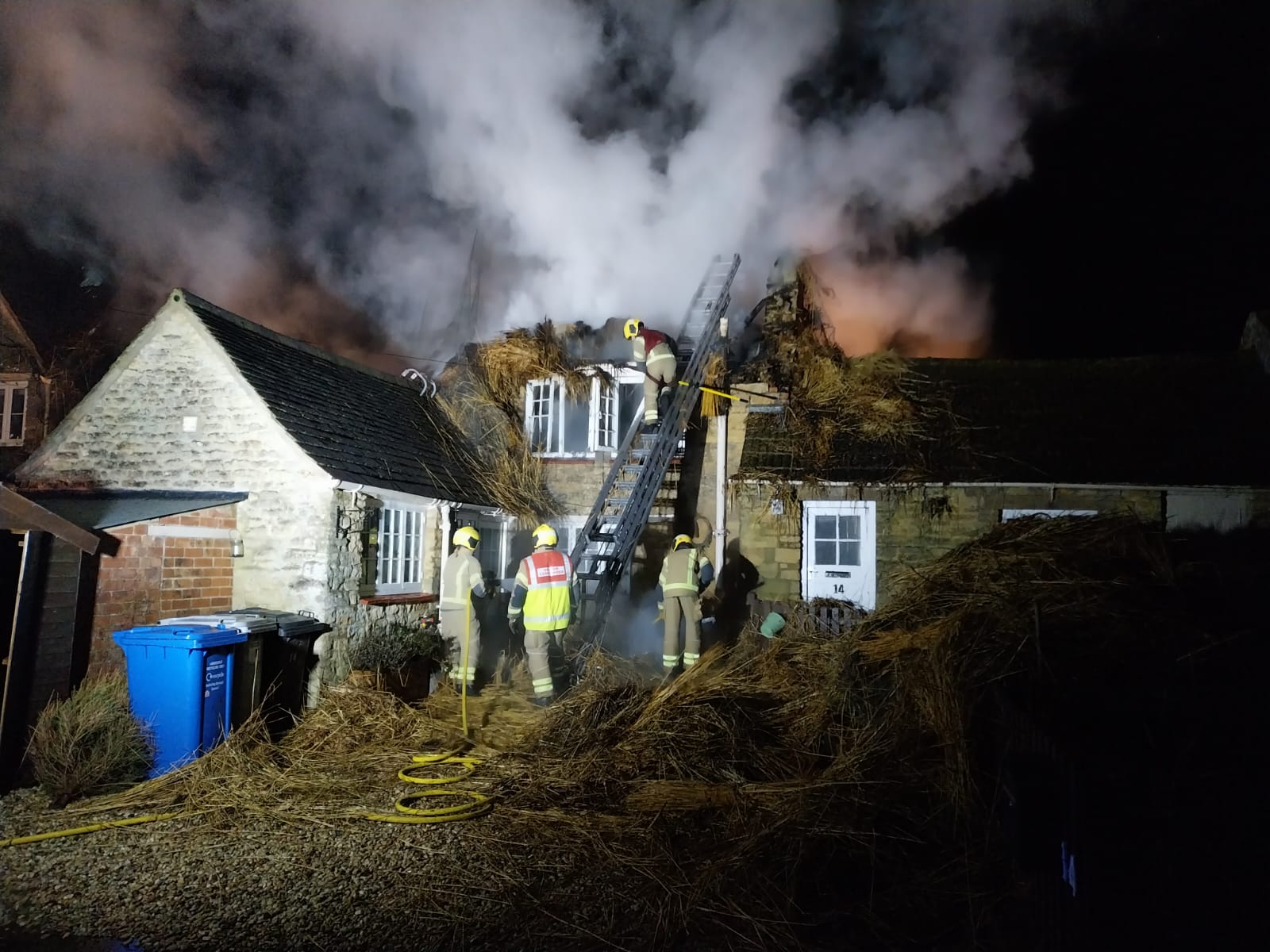 Crews tackle thatched roof house fire in Grafton Underwood ...